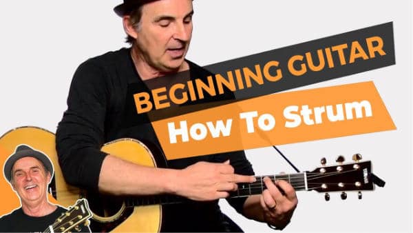 Strumming Guitar And Changing Chords - Real Guitar Lessons by Tomas Michaud