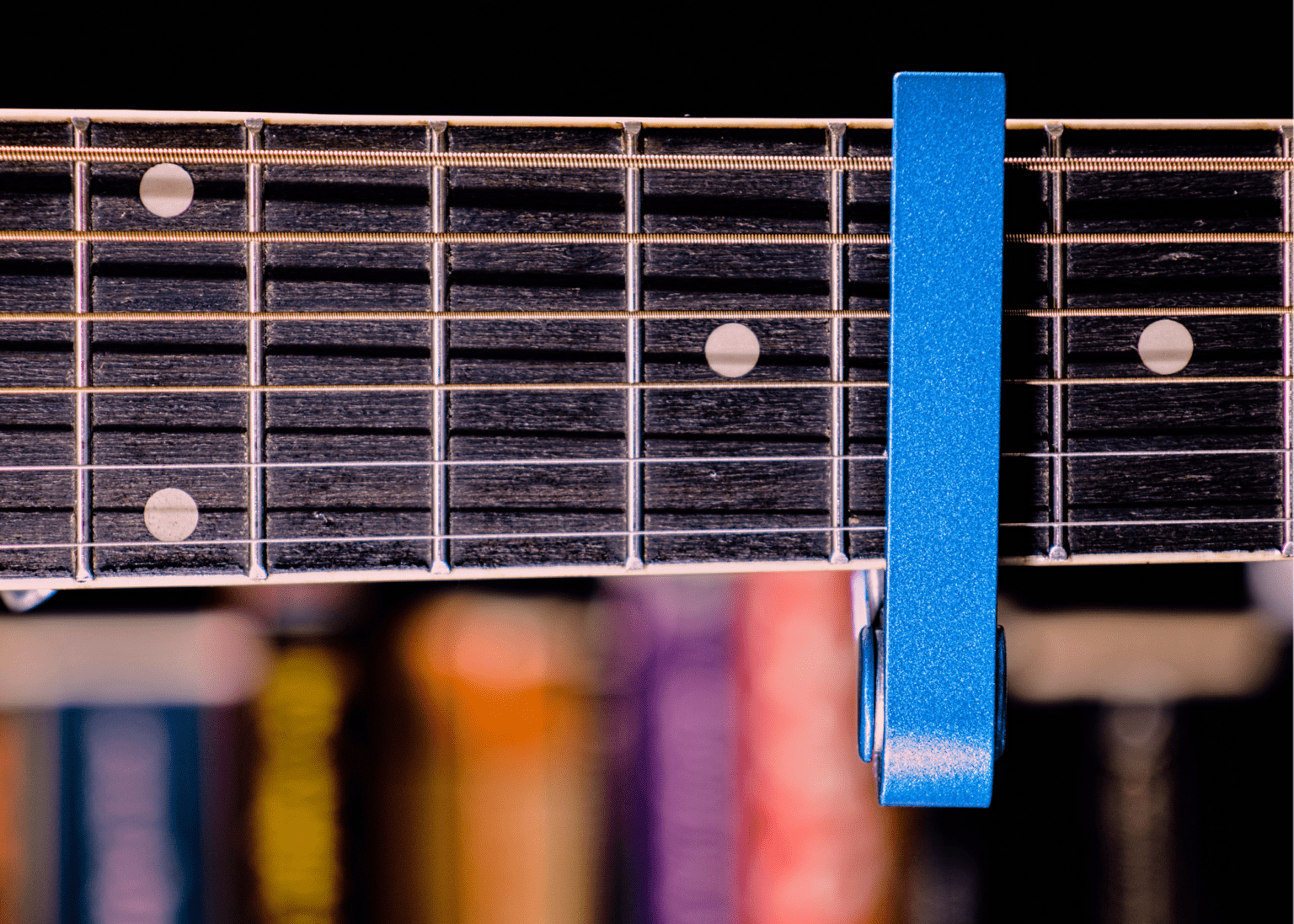 Guitar Capos Explained - Real Guitar Lessons by Tomas Michaud
