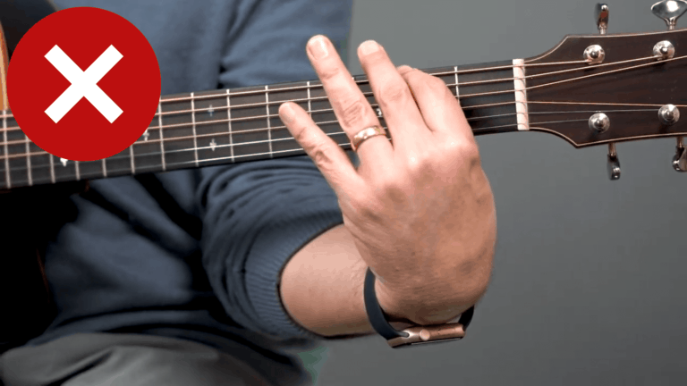 Hand Position for Guitar Chords - Real Guitar Lessons by Tomas Michaud